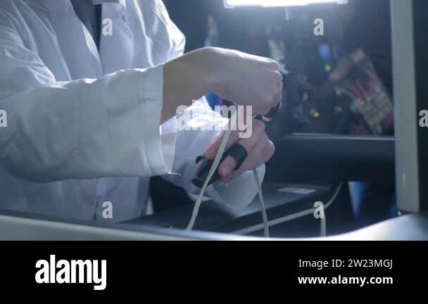 A girl surgeon performs an operation on a patient in virtual reality ...