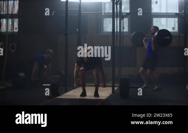 Three fitness man bodybuilder training using barbell weightlifting ...