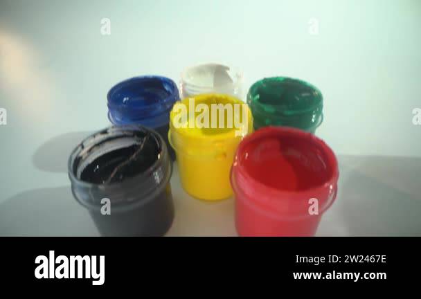 Red, Yellow, Red, blue and green paint colors on the white surface ...