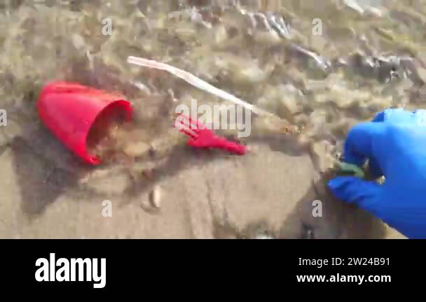 Plastic trash floats in the water. Ocean pollution with toxic waste ...