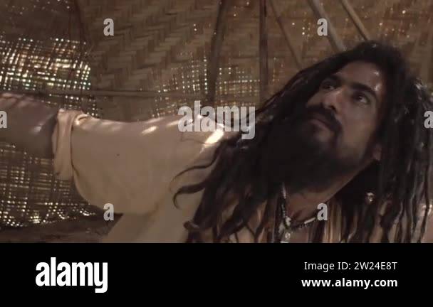 Shamanic session in the bungalow. Shaman during prayer during prayer ...
