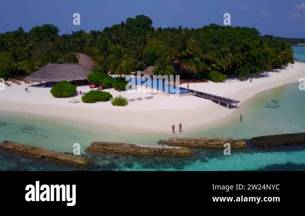 Daytime seascape of perfect island beach break by aqua blue lagoon and ...