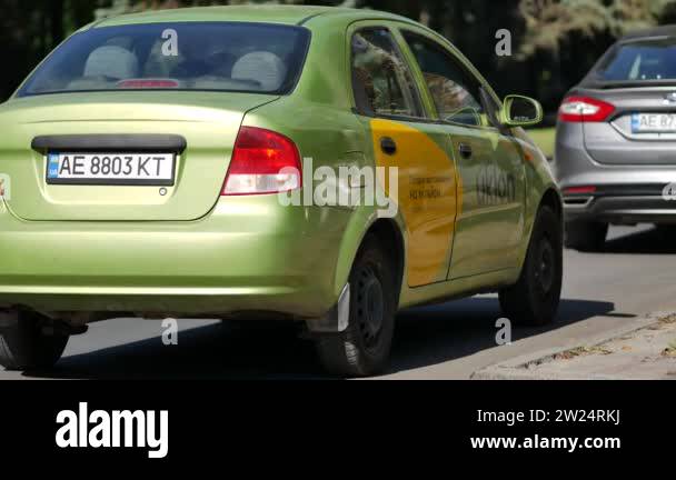 Uklon internet taxi service. Branded car with Uklon logo on the door ...