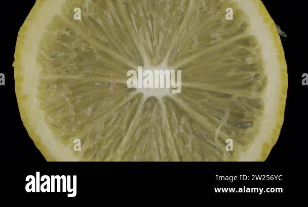 Rotation, closeup of fresh, juicy pulp of an lemon. Background and ...