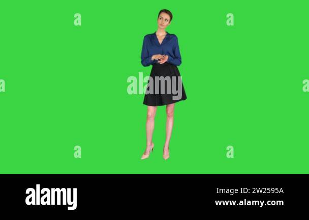 Beautiful young woman thinking, day dreaming on a Green Screen, Chroma ...