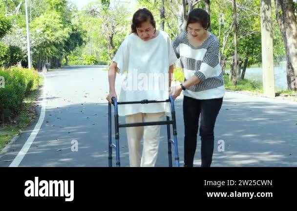 Woman with walking aid Stock Videos & Footage - HD and 4K Video Clips ...