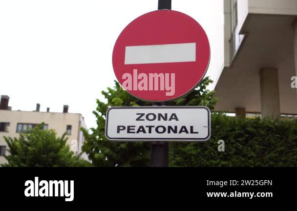 Traffic signs ENTRY PROHIBITED and PEDESTRIAN AREA with an inscription ...