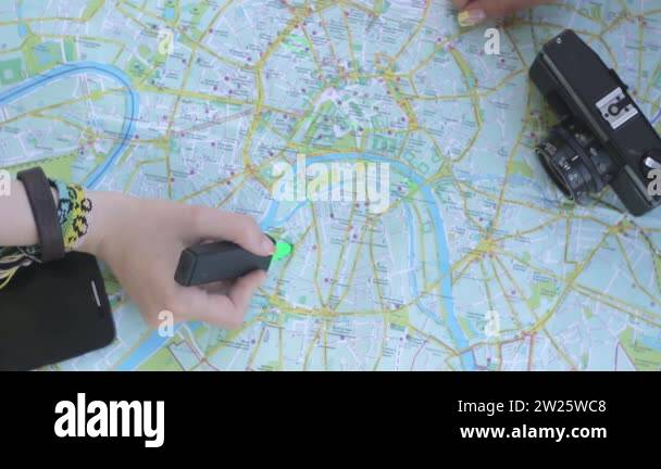 marking highlight on tourist place on guide map Stock Video Footage - Alamy