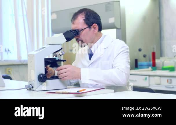 Chemist. A scientist conducts experiments in a scientific laboratory ...