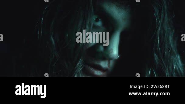 Terrifying creepy zombie woman with white eyes and bloody face. Scary ...