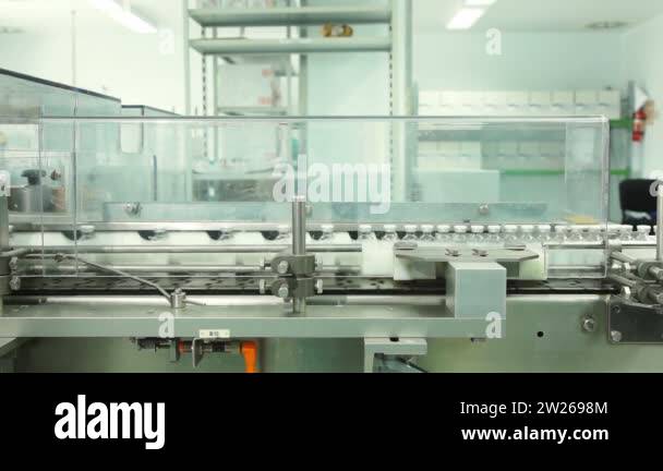 Bottles with drugs on the conveyor line in pharmaceutical factory Stock ...