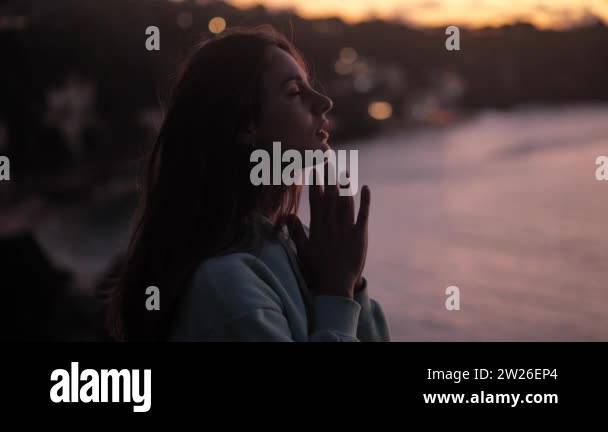 close up portrait of beautiful woman enjoying peaceful sunset exploring ...