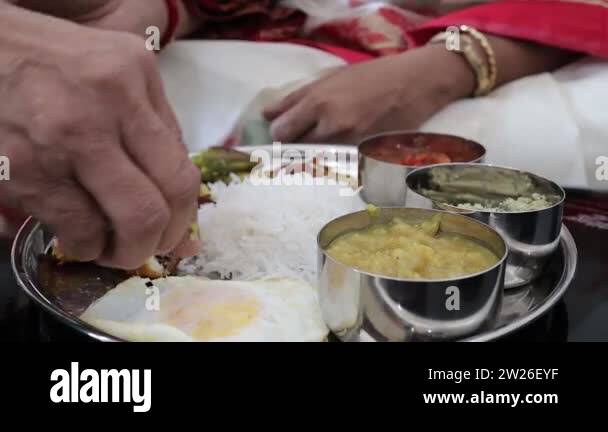 Rice fish and dal Stock Videos & Footage - HD and 4K Video Clips - Alamy