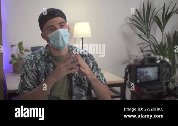 Young man vlogger record video on camera for social media channel ...