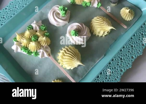 Cooking marshmallows of different shapes, colors and sizes. The ...