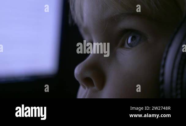 Close-up Child Blue Eyes. Reflection Computer Monitor TV Screen ...