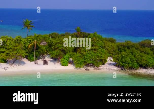 Close up tourism of idyllic coast beach adventure by shallow ocean with ...