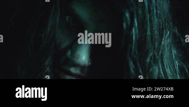 Terrifying creepy zombie woman with white eyes and bloody face. Scary ...