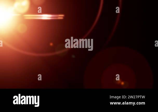 Optical lens flares transition seamless loop. 4K beautiful big orange ...