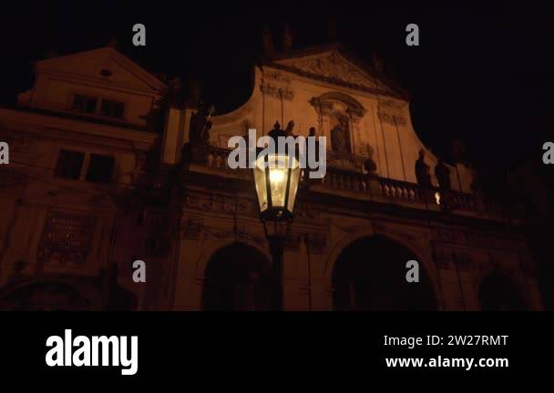 lit street lights and lamps and lights from them in the old town in the ...