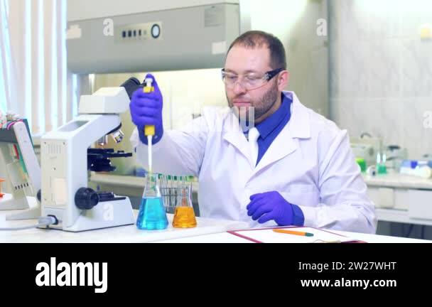 Chemist. A scientist conducts experiments in a scientific laboratory ...