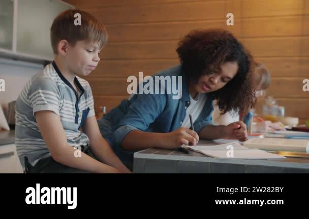 Sister explaining to brother Stock Videos & Footage - HD and 4K Video ...