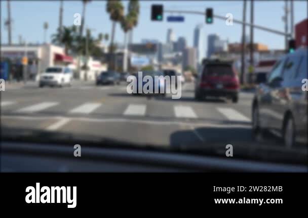 Driving on downtown streets of Los Angeles, California USA. Defocused ...