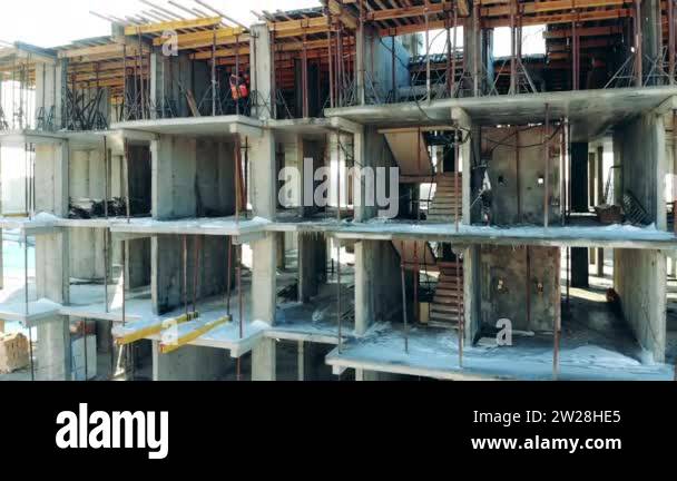 Multiple floors of a concrete building under construction. Construction ...