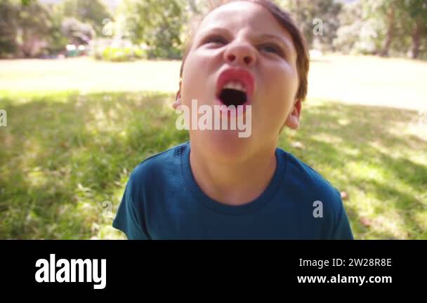 Boy pulling a face Stock Videos & Footage - HD and 4K Video Clips - Alamy