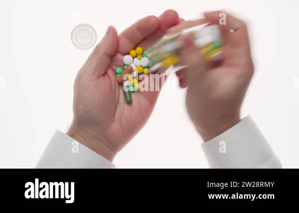 Man hand with pills, tablets, vitamins, drugs, capsules isolated on ...