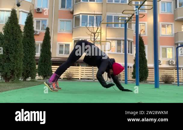 Fit Girl Doing Pushup Exercise Outdoor In The City Street.Fitness Woman ...