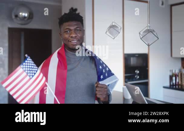 Man usa flag in hand Stock Videos & Footage - HD and 4K Video Clips - Alamy