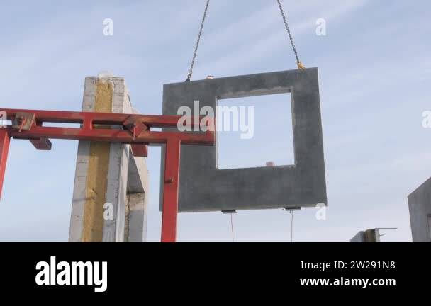 lifting mechanism moves up wall panel to install in building Stock ...