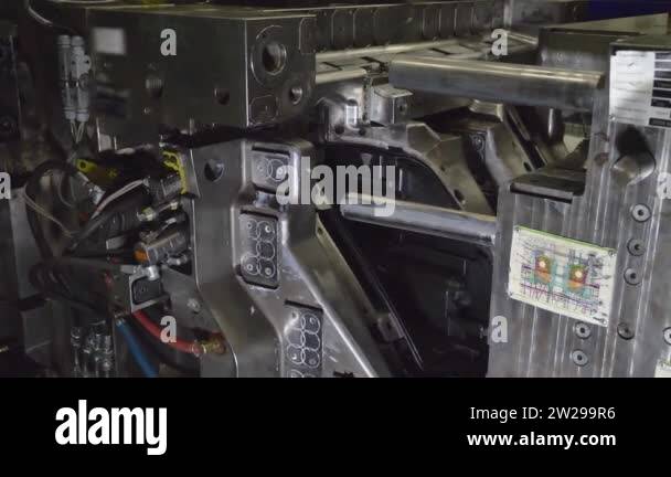 Automatic Plastic Injection Molding Machine, Robotics Arm Removes the ...