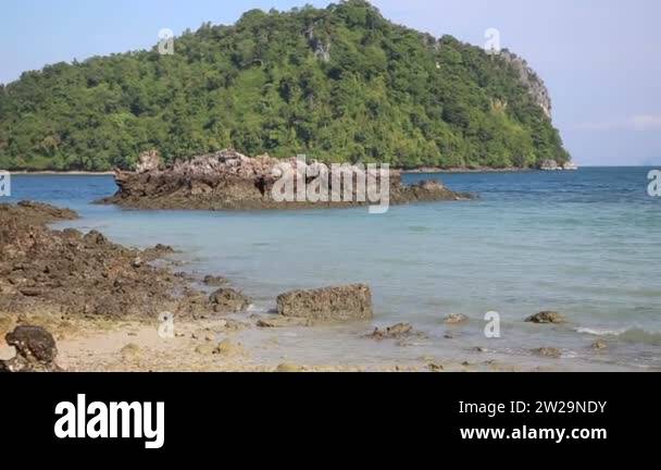 Tropic island in azure sea in Thailand Stock Video Footage - Alamy
