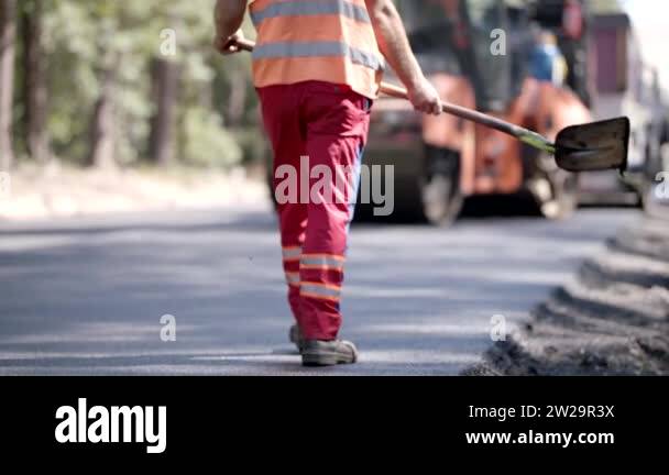 Road construction worker Stock Videos & Footage - HD and 4K Video Clips ...