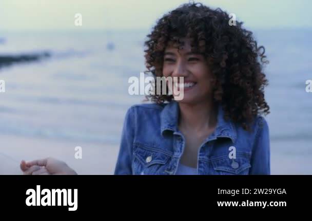 Holiday concept. Beautiful girl playing fireworks with excitement on ...