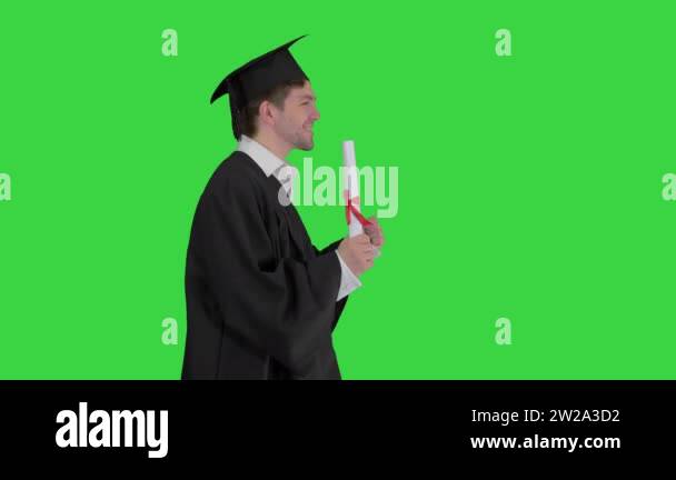 Man walking to the graduation ceremony on a Green Screen, Chroma Key ...