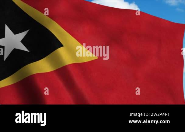 East Timor flag waving in the wind, blue sky background. 4K Stock Video ...