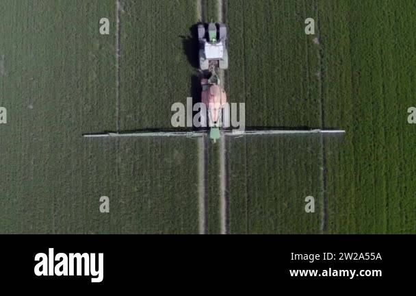 Tractor Spraying A Banned Glyphosate Herbicide On Agricultural Land