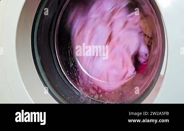 rotation of the Laundry drum of an industrial automatic washing machine ...