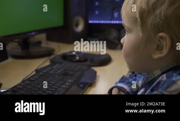 Serious Little Child Studying Learning Watching Internet Videos. Boy ...