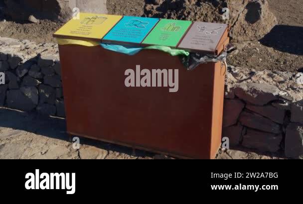 Trash cans for sorting garbage. Text in different languages Stock Video ...