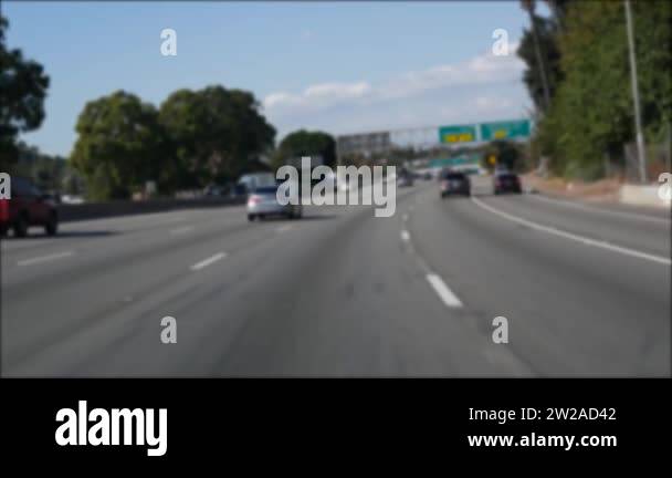 Driving on intercity freeway in Los Angeles, California USA. Defocused ...
