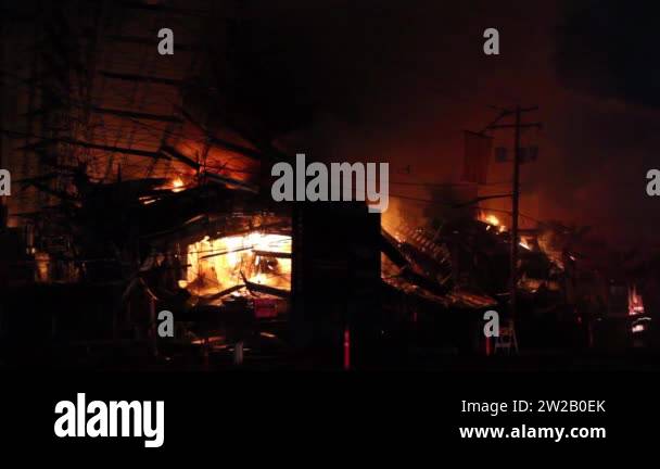 Pile of burning debris are what's left from fire at building under ...