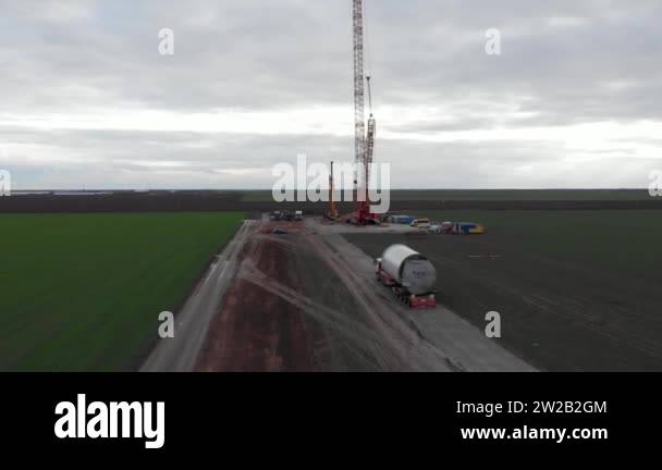 Building process of wind energy power tower, windmill under ...