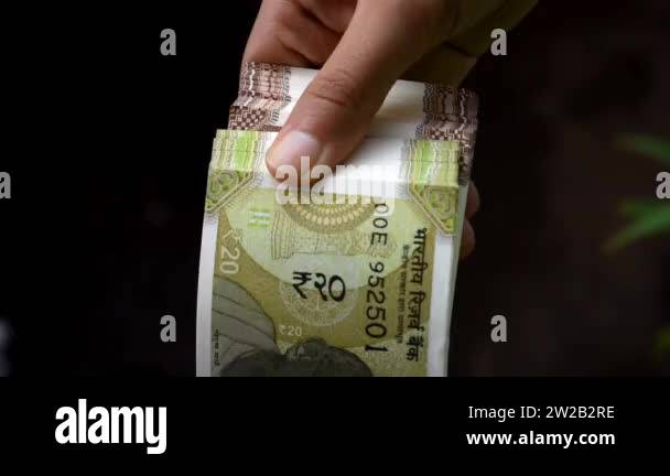 Superfast Indian currency notes counting by women hand Stock Video ...