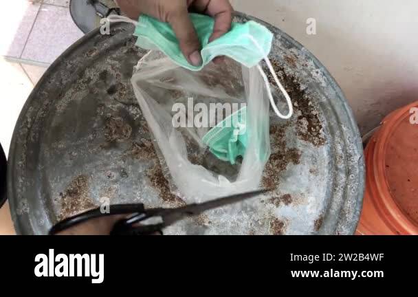 Concept of prevented covid-19.Management of used infectious masks as ...