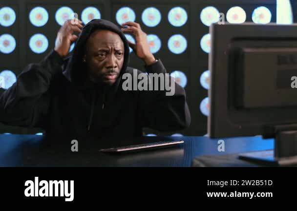 Worried-looking african-american mature man with swearing face is ...