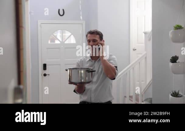 Man Calling Emergency Plumber After Water Leak At Home. Upset Man ...